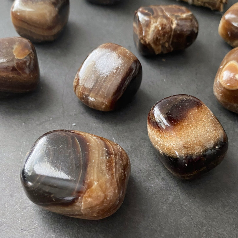 Chocolate Calcite Tumbled Stones | Root Beer, Coke Brown | The Stone ...